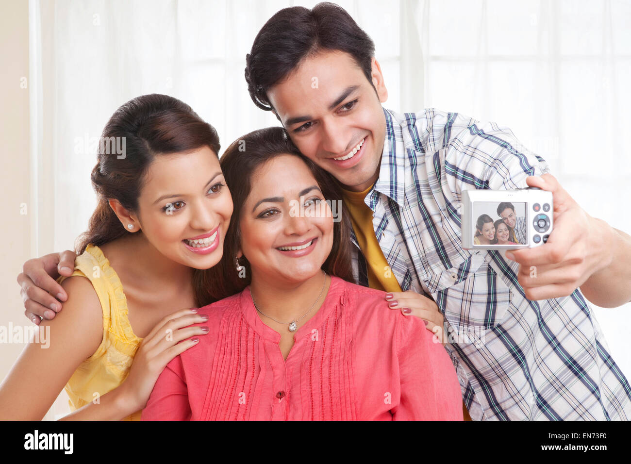 Family taking a self portrait Stock Photo - Alamy