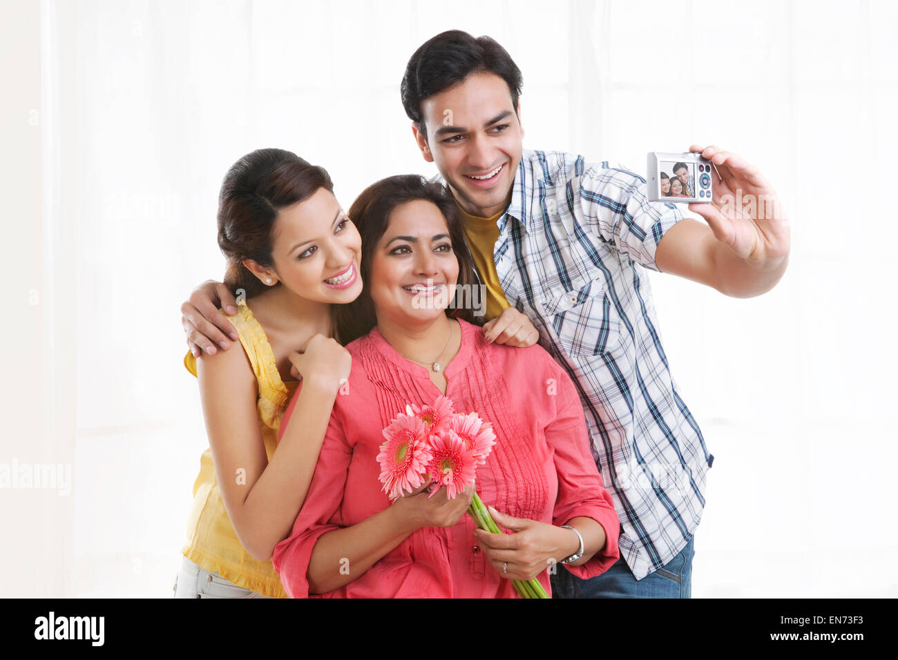 Family taking a self portrait Stock Photo - Alamy