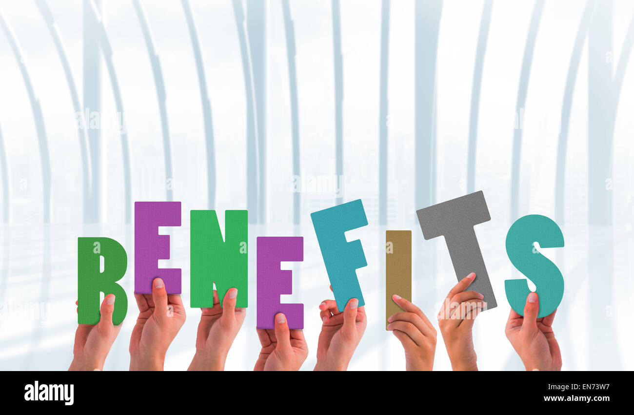 Composite image of hands holding up benefits Stock Photo - Alamy