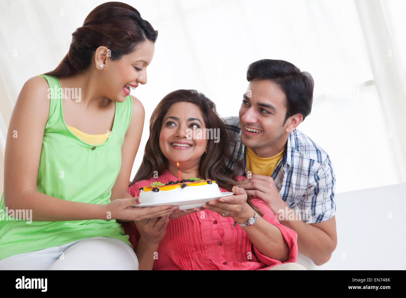 Family celebrating mothers day Stock Photo - Alamy