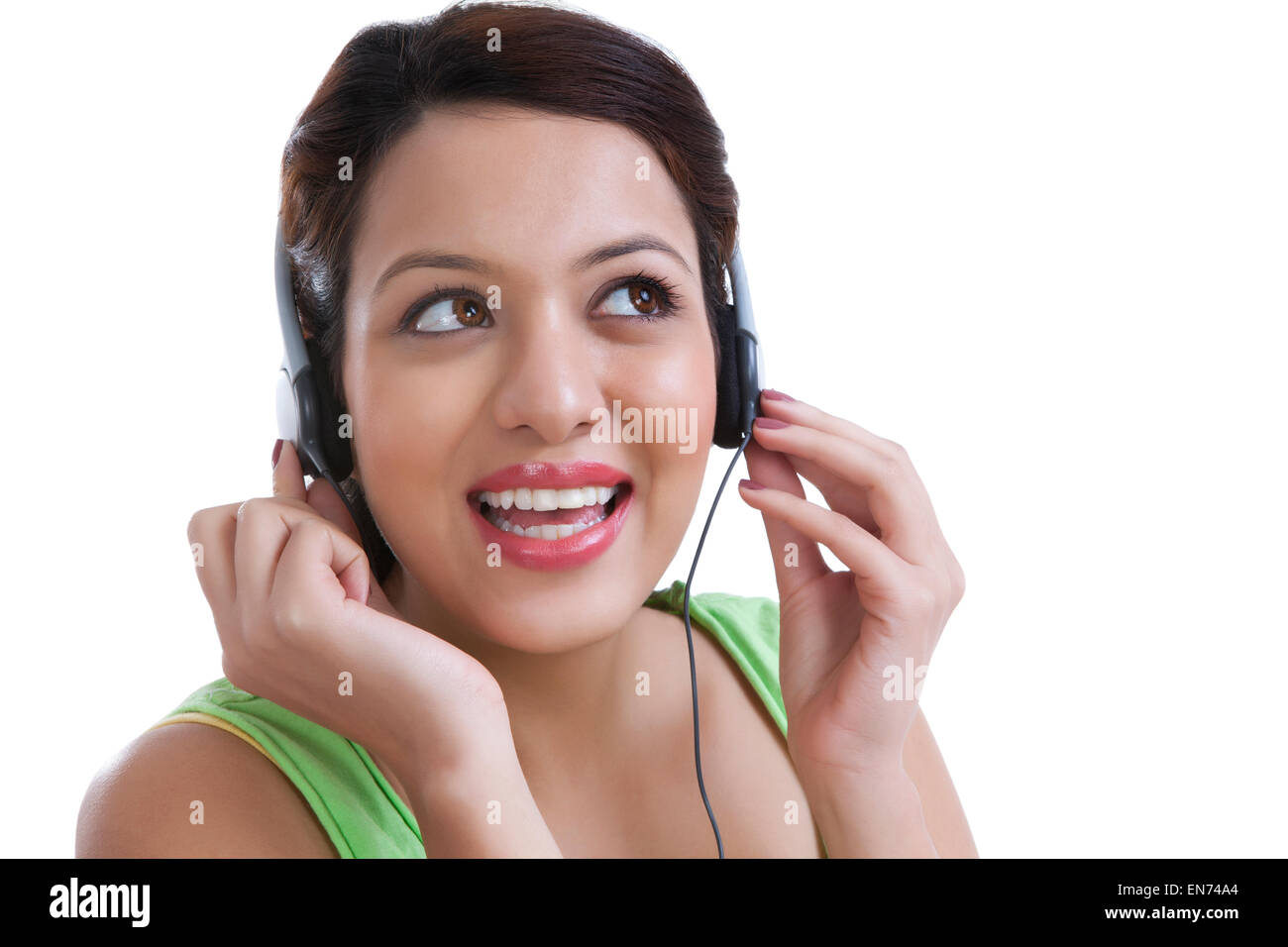 Close up young woman listening hi-res stock photography and images - Alamy