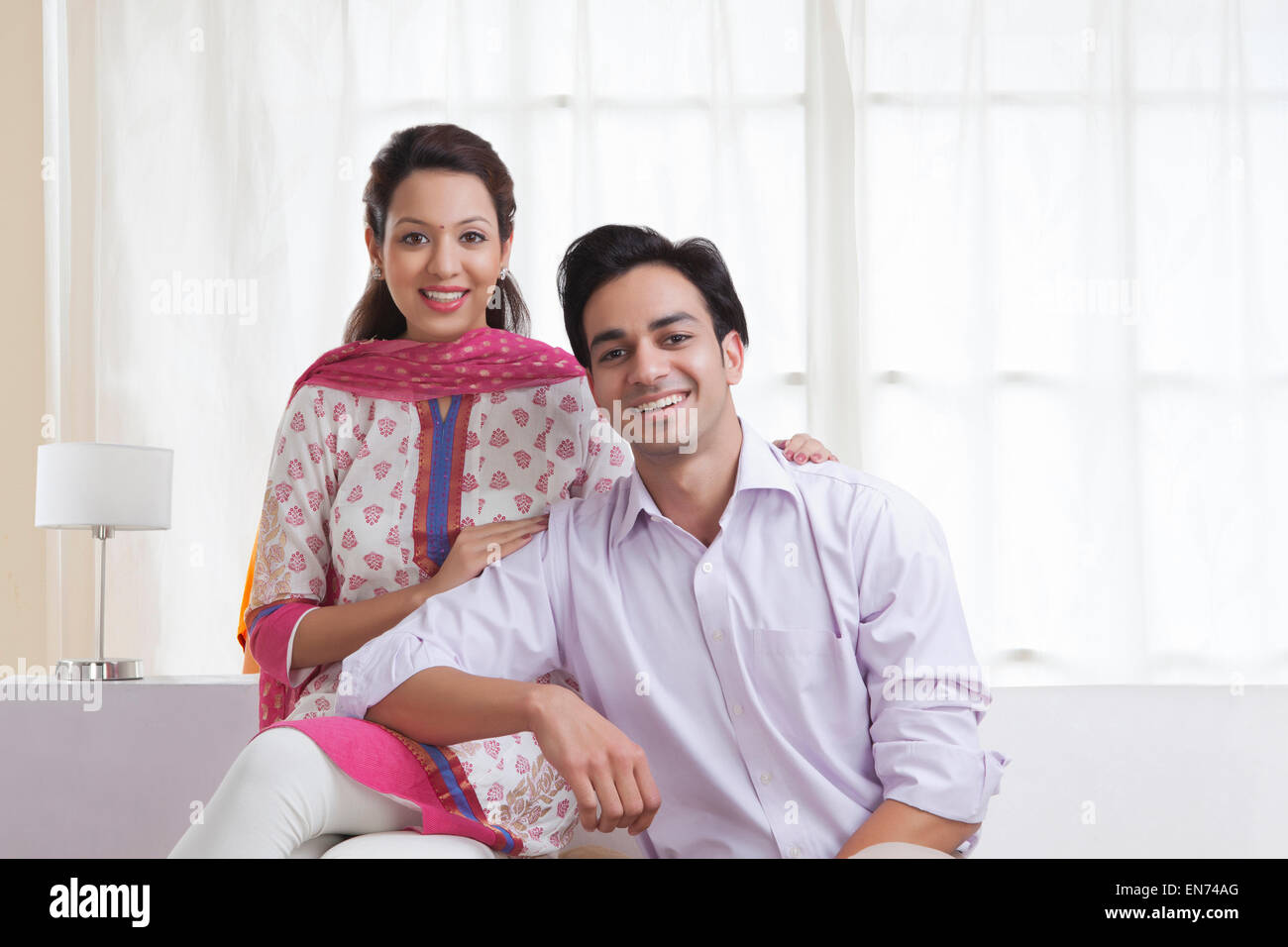 Portrait of a married couple smiling Stock Photo - Alamy