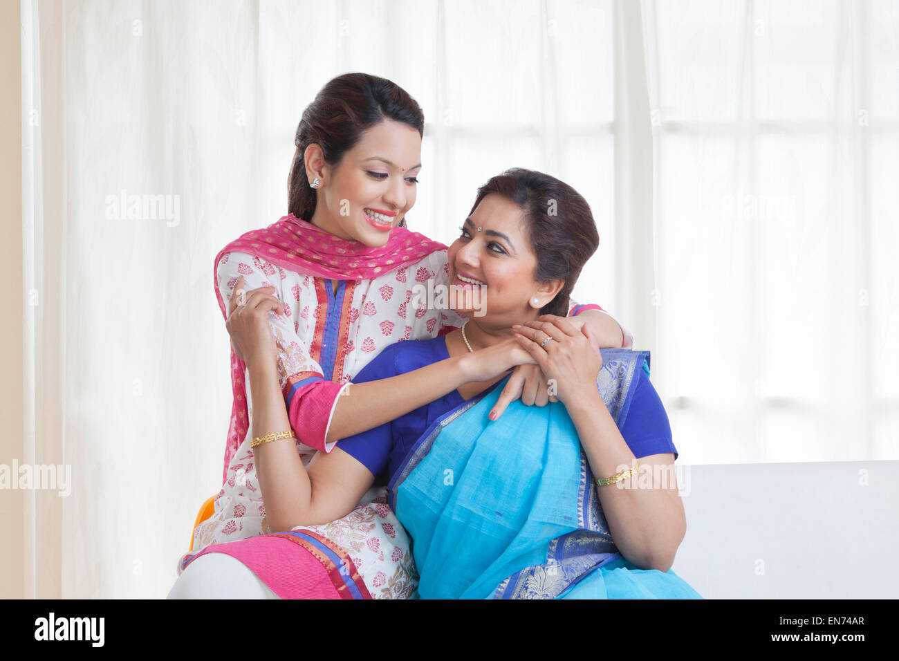 Daughter embracing mother bonding hi-res stock photography and images - Alamy