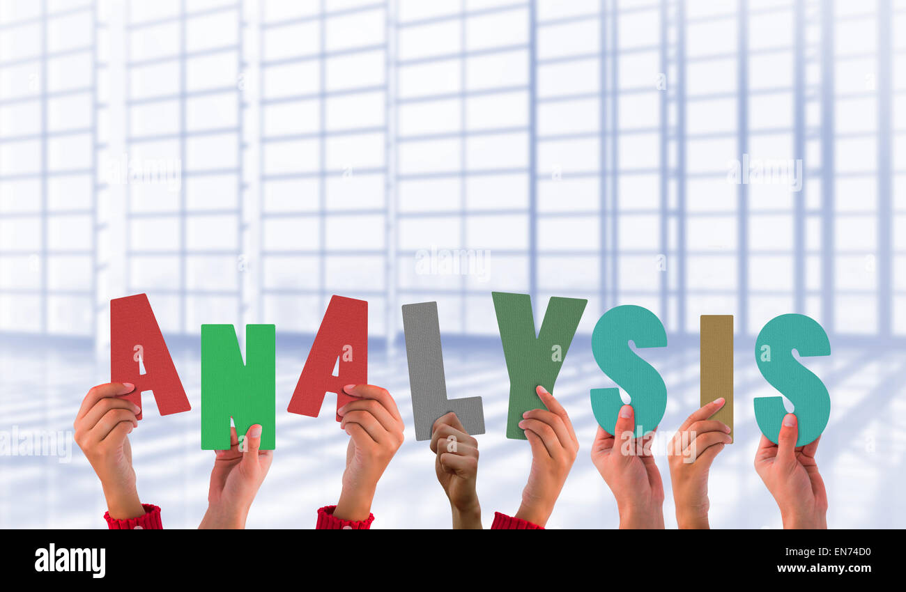 Composite image of hands holding up analysis Stock Photo - Alamy