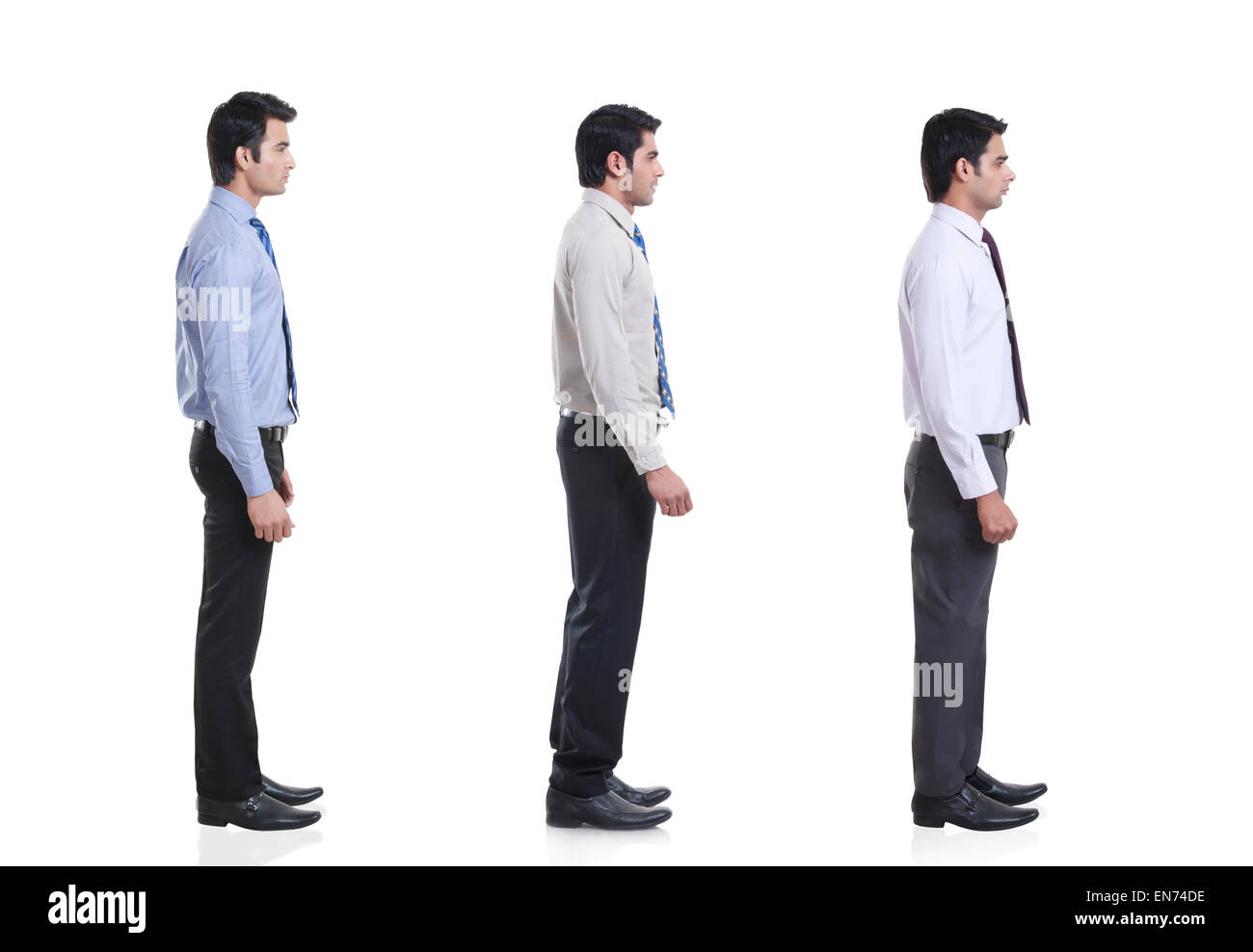 Side profile of male executives Stock Photo - Alamy