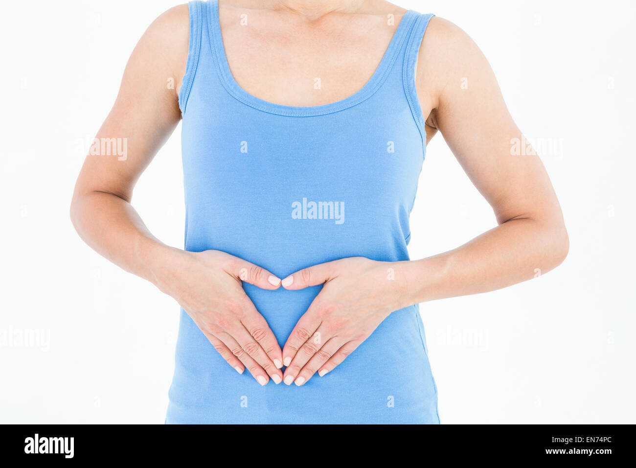 Woman touching her painful stomach Stock Photo - Alamy