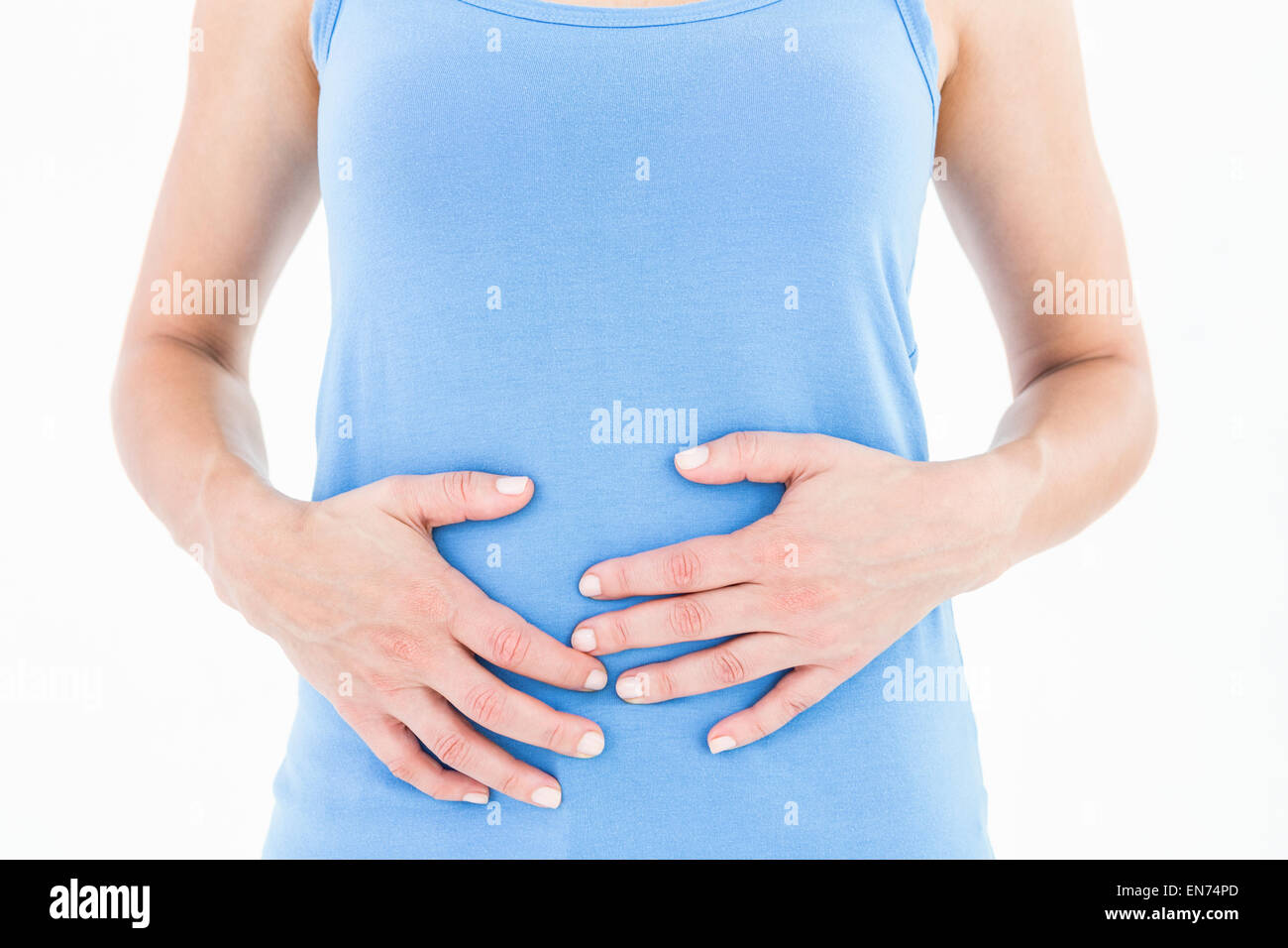 Woman touching her painful stomach Stock Photo - Alamy