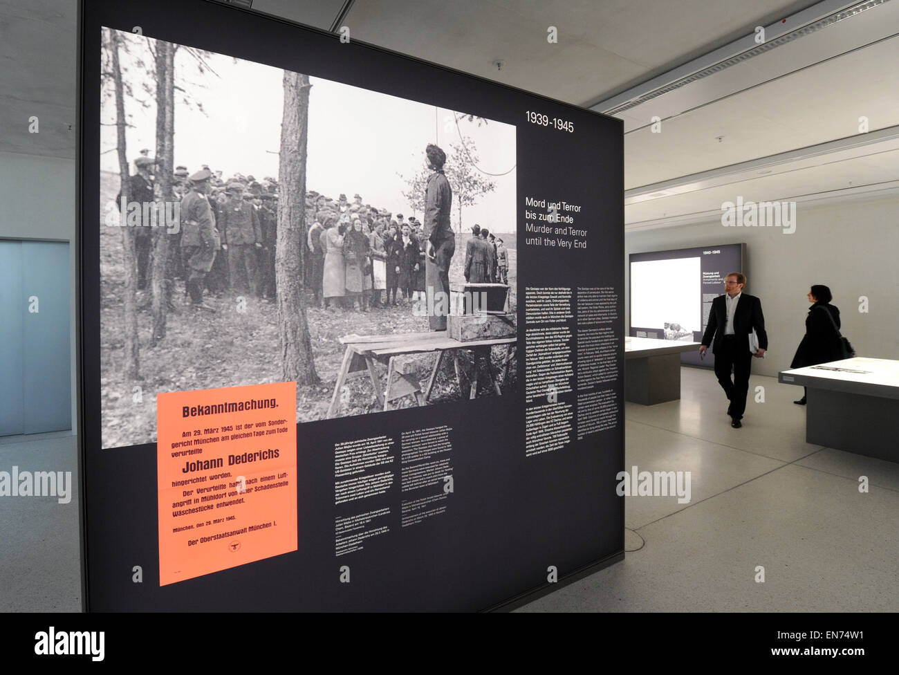 Munich, Germany. 29th Apr, 2015. Visitors stand in an exhibition room ...
