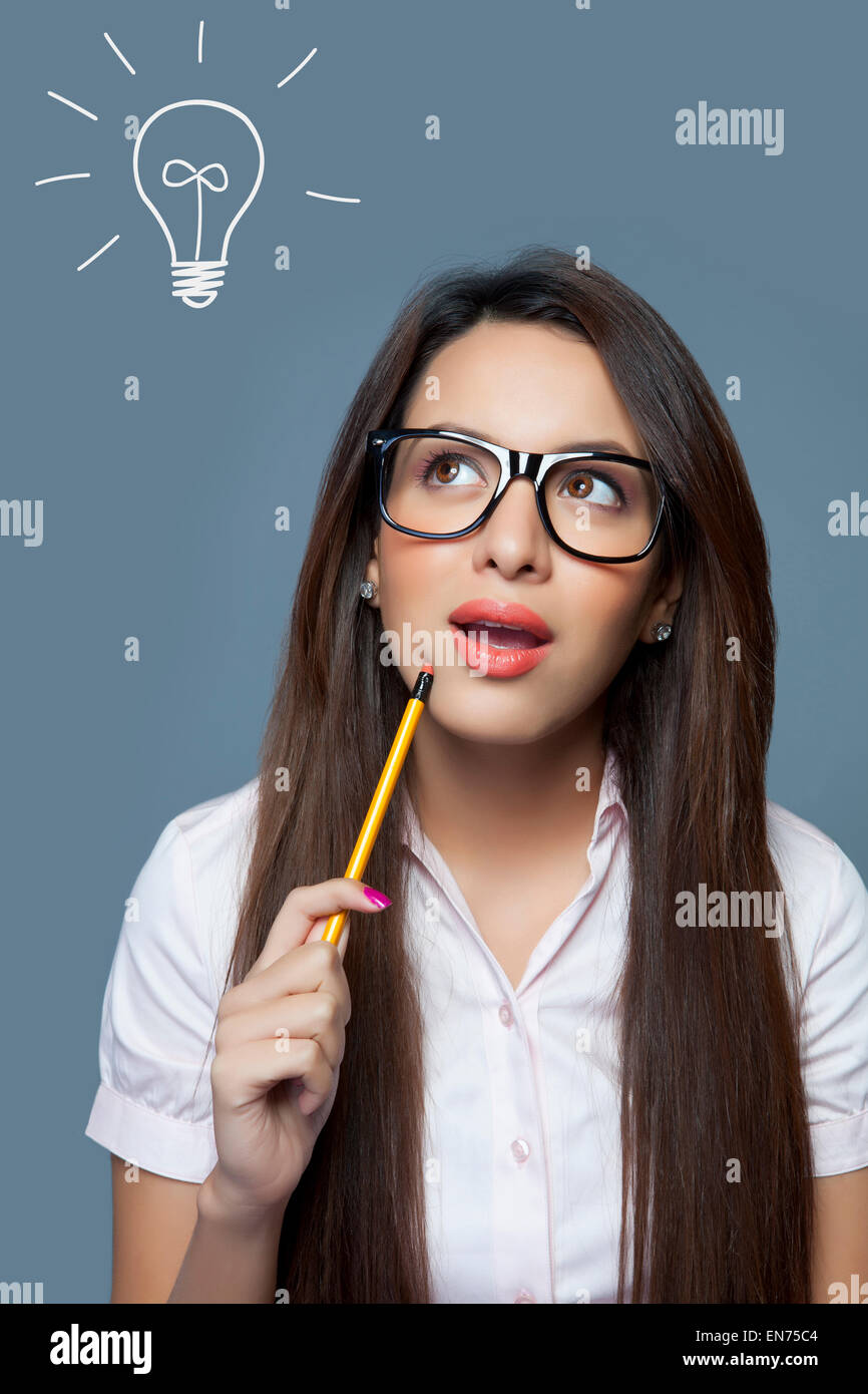 Female executive with an idea Stock Photo - Alamy
