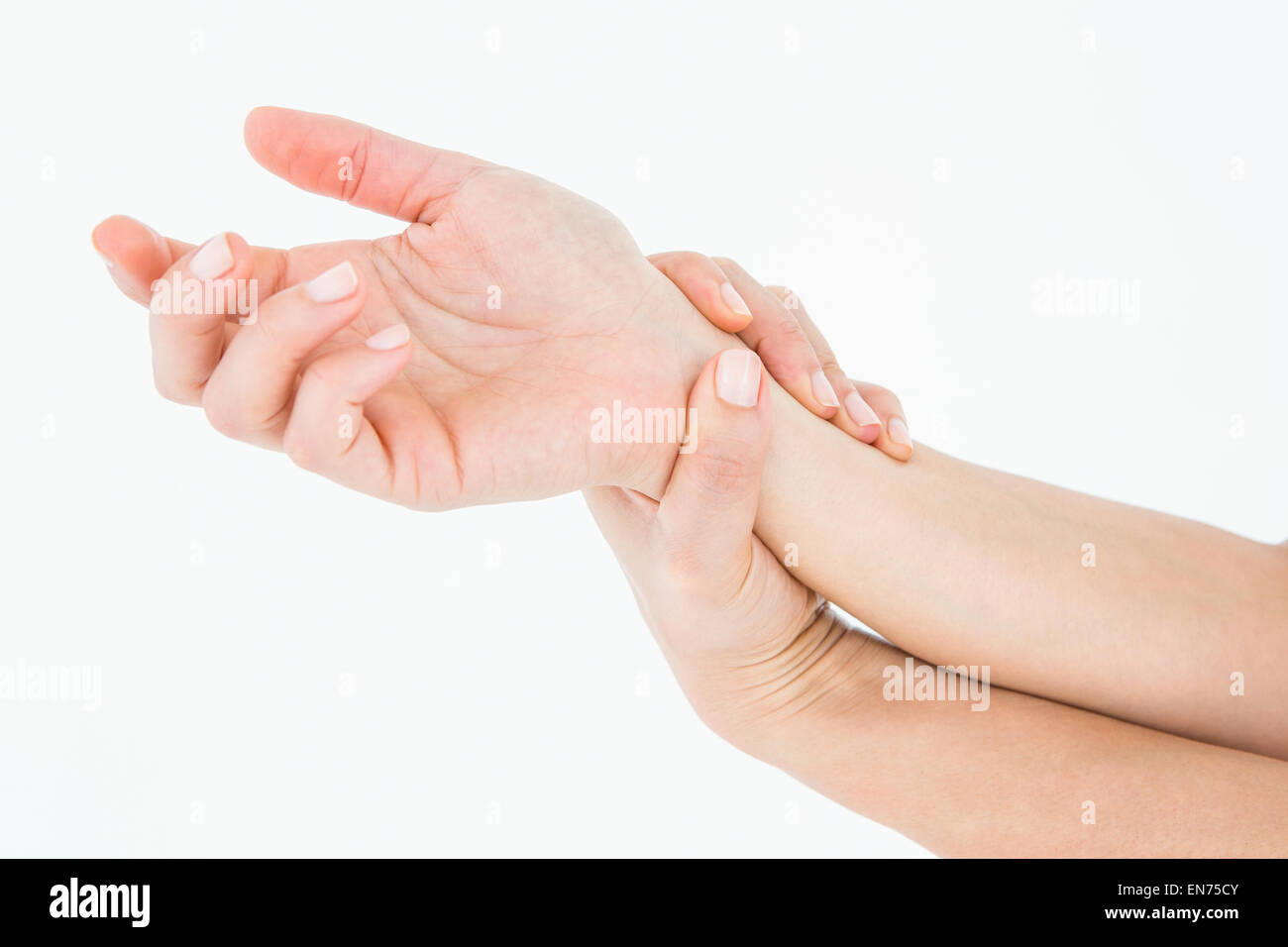 Woman suffering from hand pain Stock Photo - Alamy