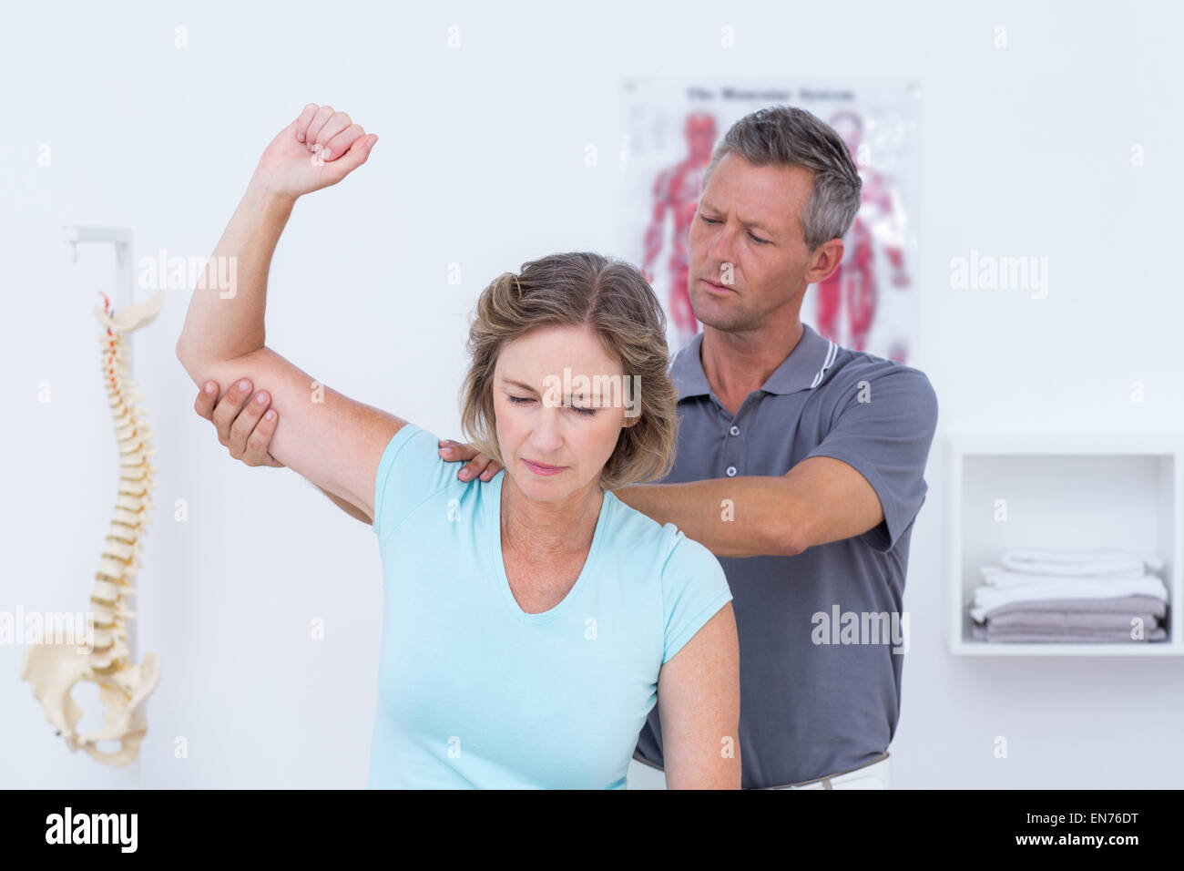 Doctor examining his patient arm Stock Photo - Alamy