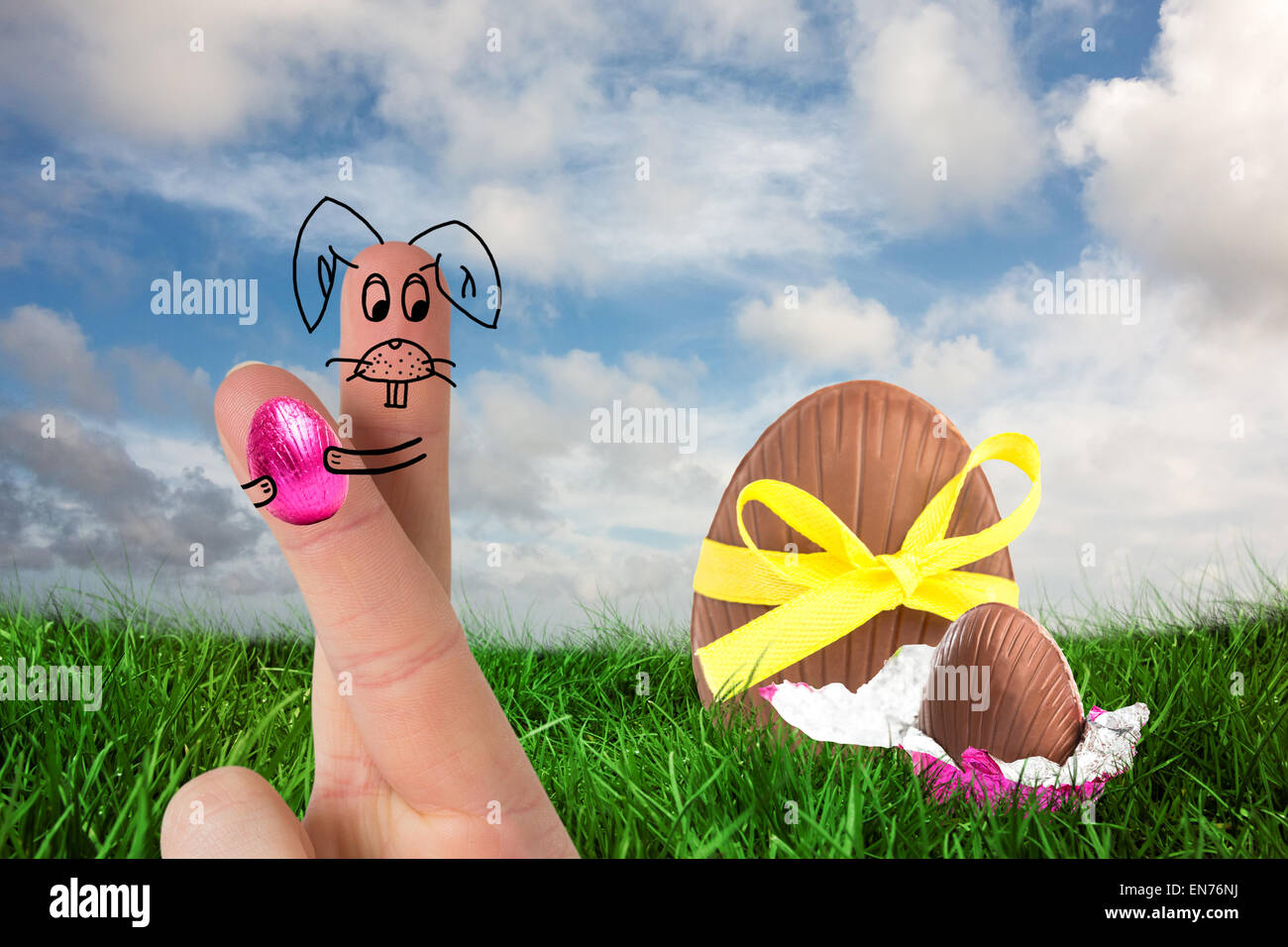 Composite image of fingers as easter bunny Stock Photo - Alamy