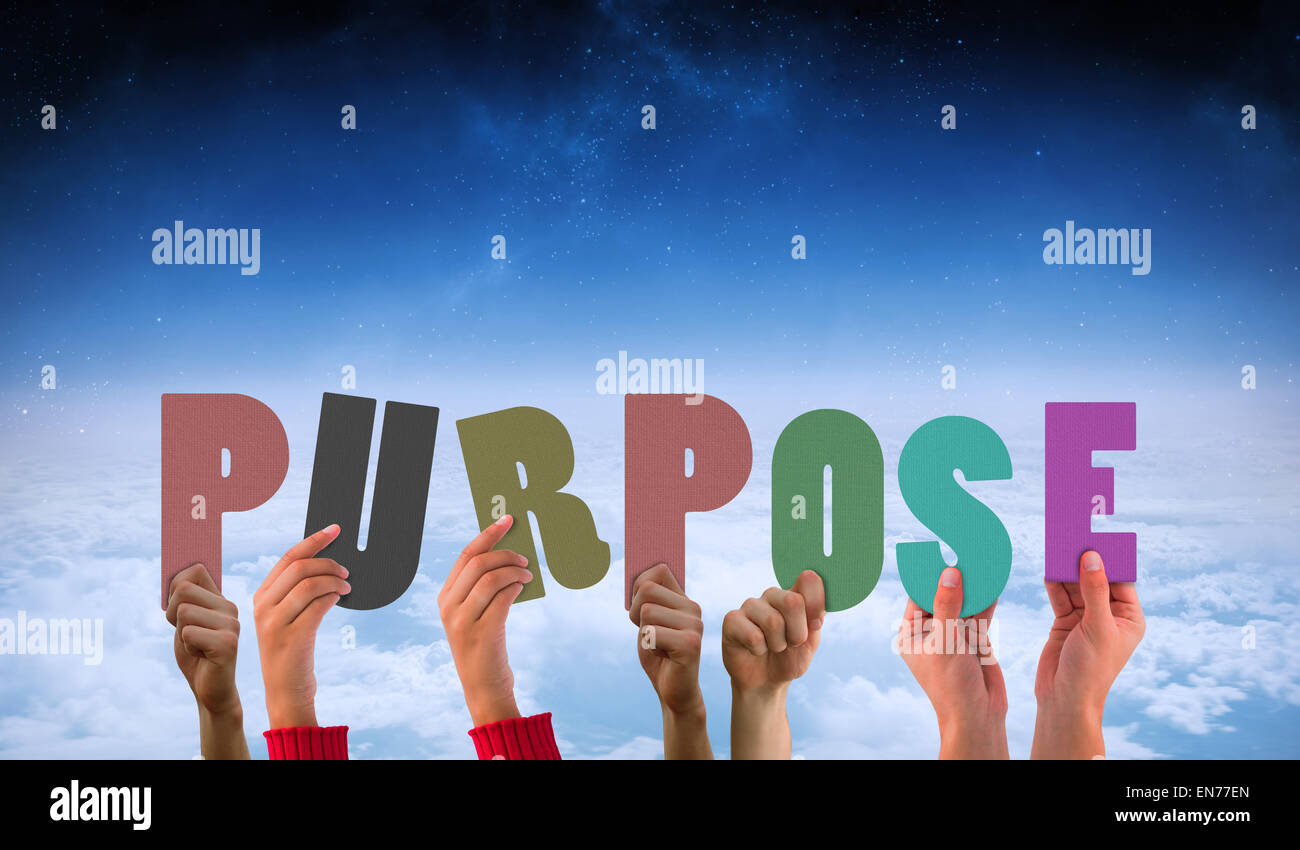 Composite image of hands holding up purpose Stock Photo - Alamy
