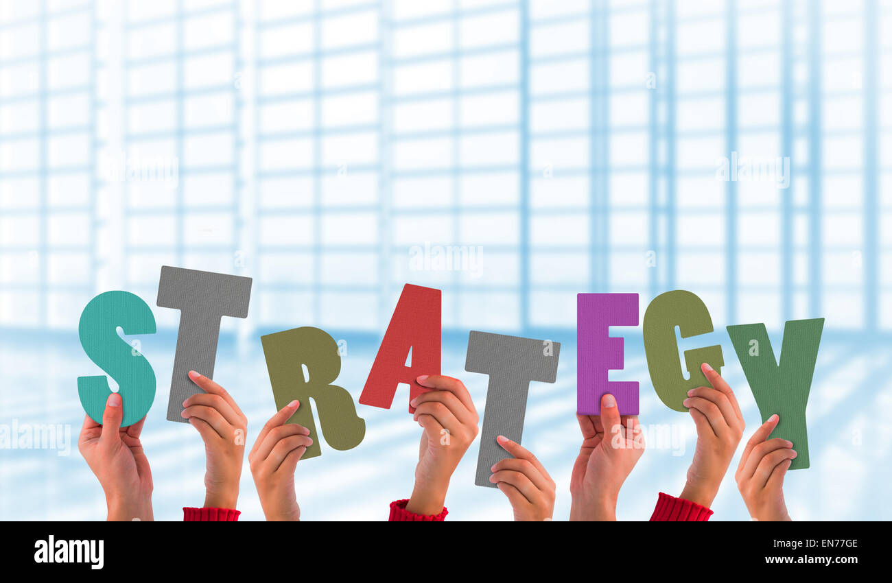 Composite image of hands showing strategy Stock Photo - Alamy