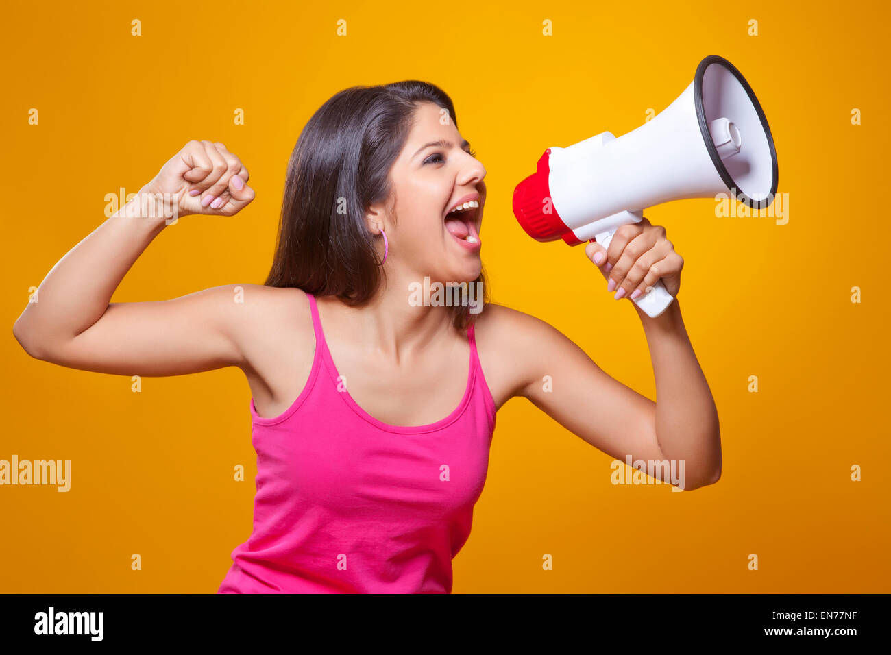 Young woman screaming into a megaphone Stock Photo - Alamy Young woman screaming into a megaphone Stock Photo - Alamy