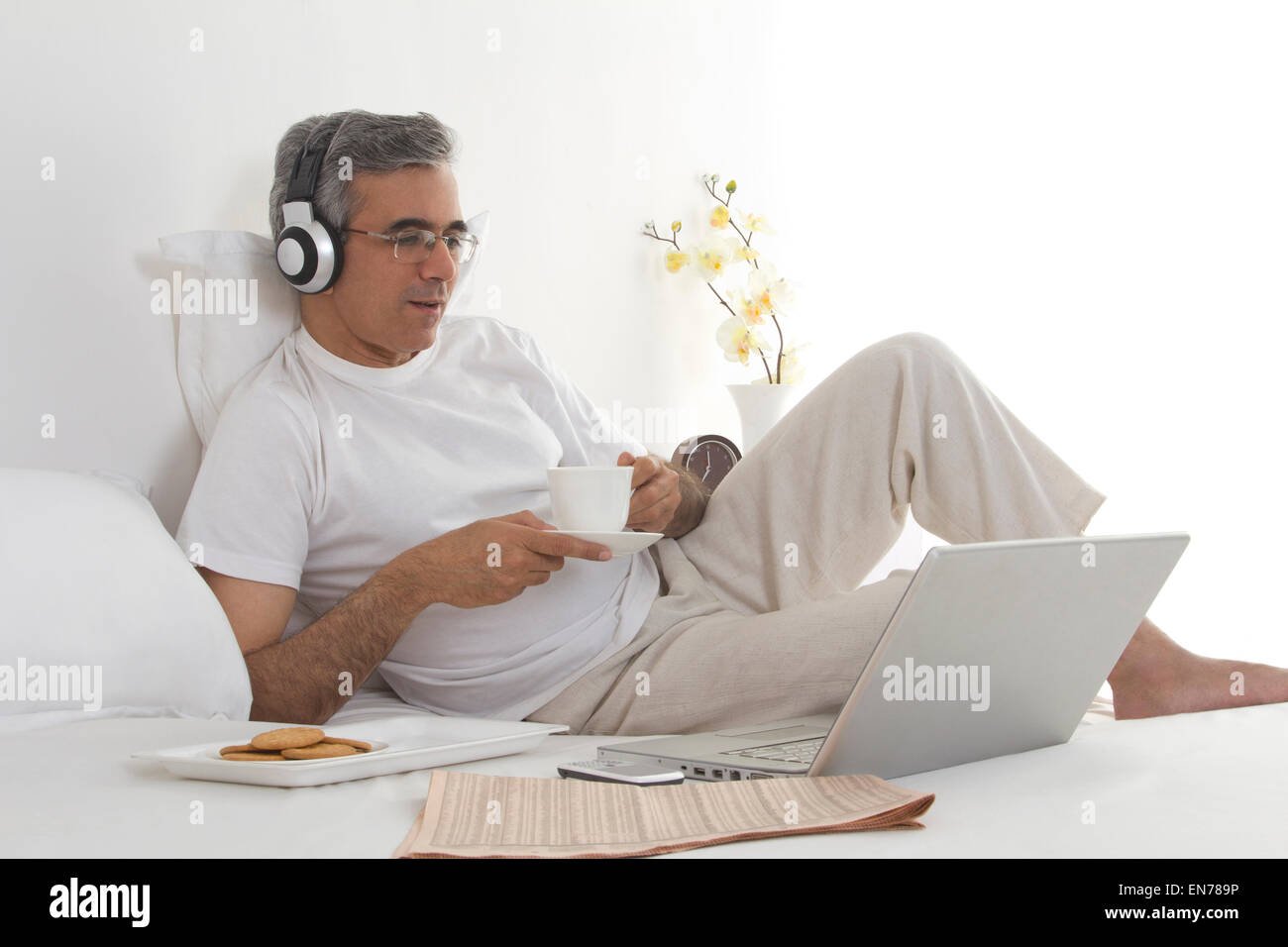 Man working on his laptop Stock Photo - Alamy
