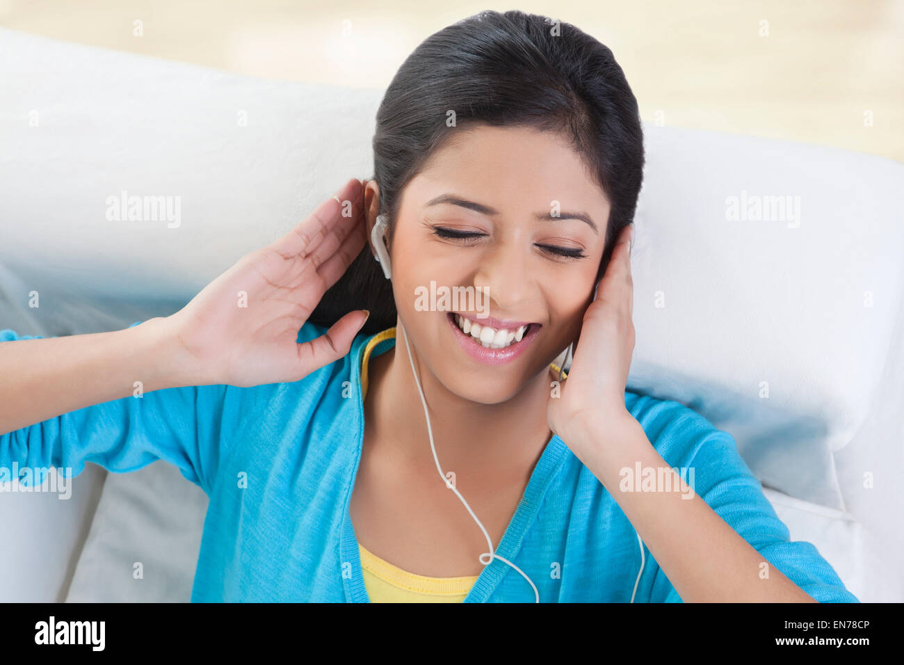 Girl listening to music Stock Photo - Alamy