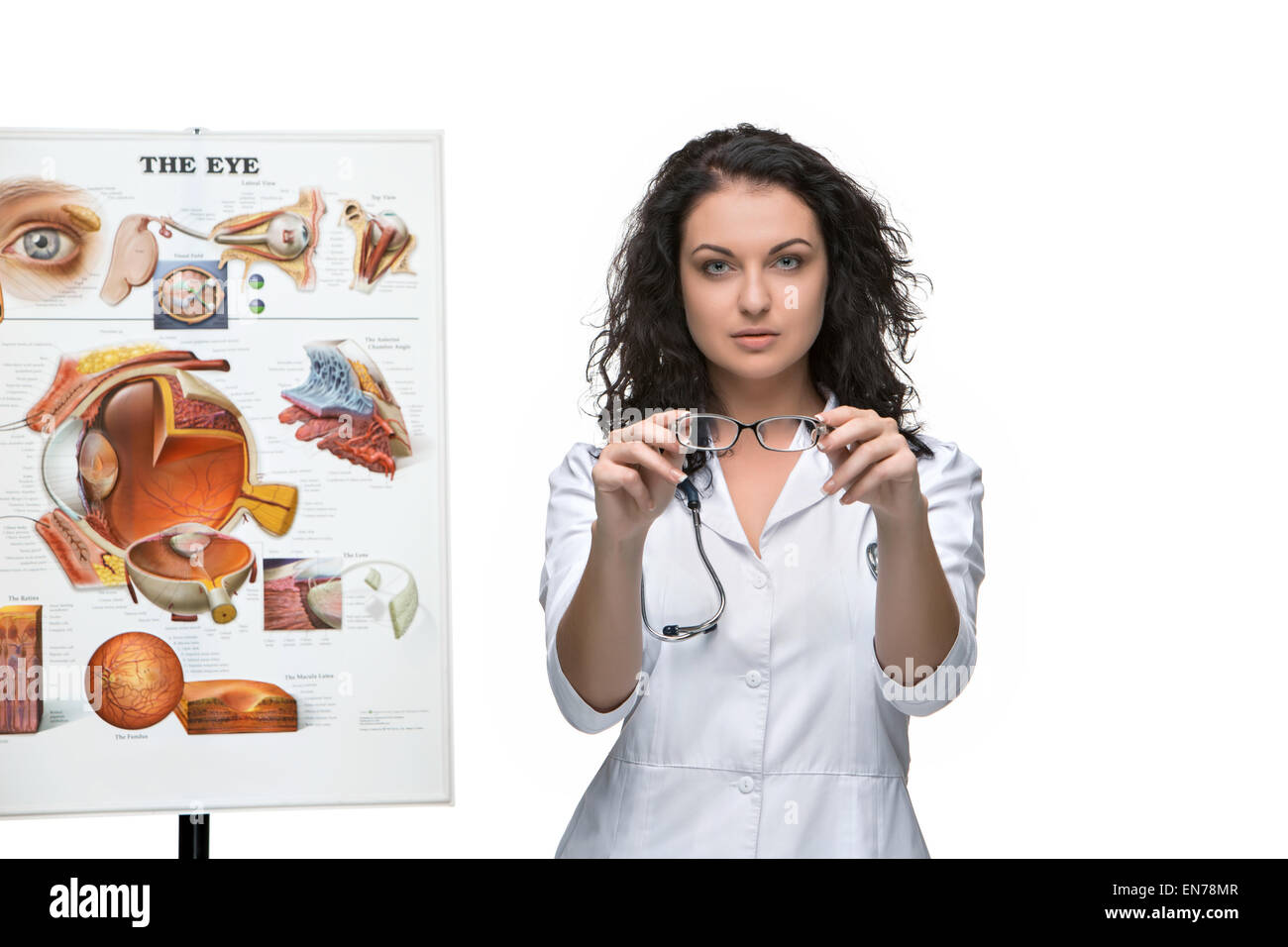 Optician or oculist woman giving a pair of glasses Stock Photo - Alamy