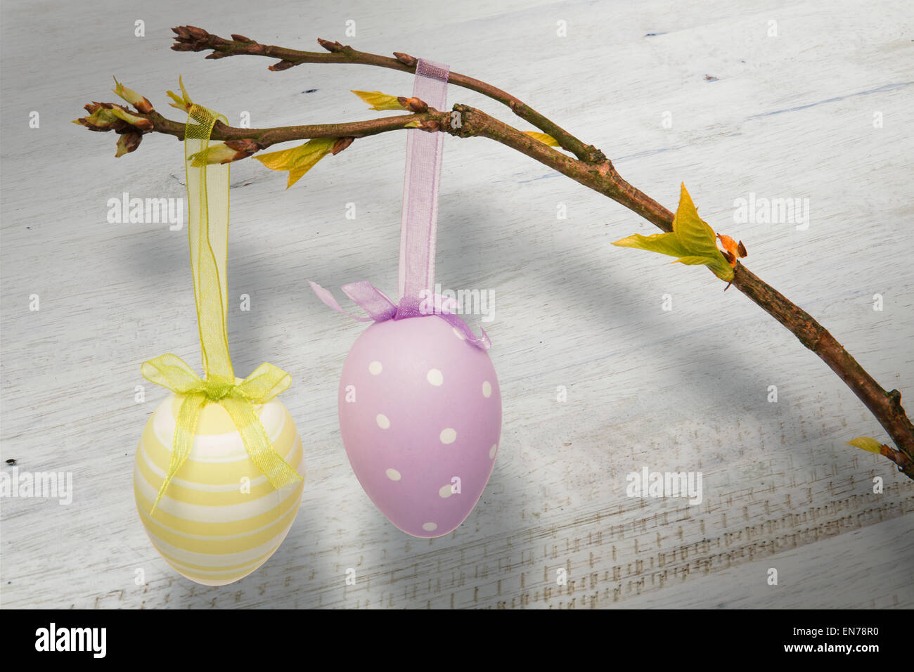 Composite image of hanging easter eggs Stock Photo - Alamy