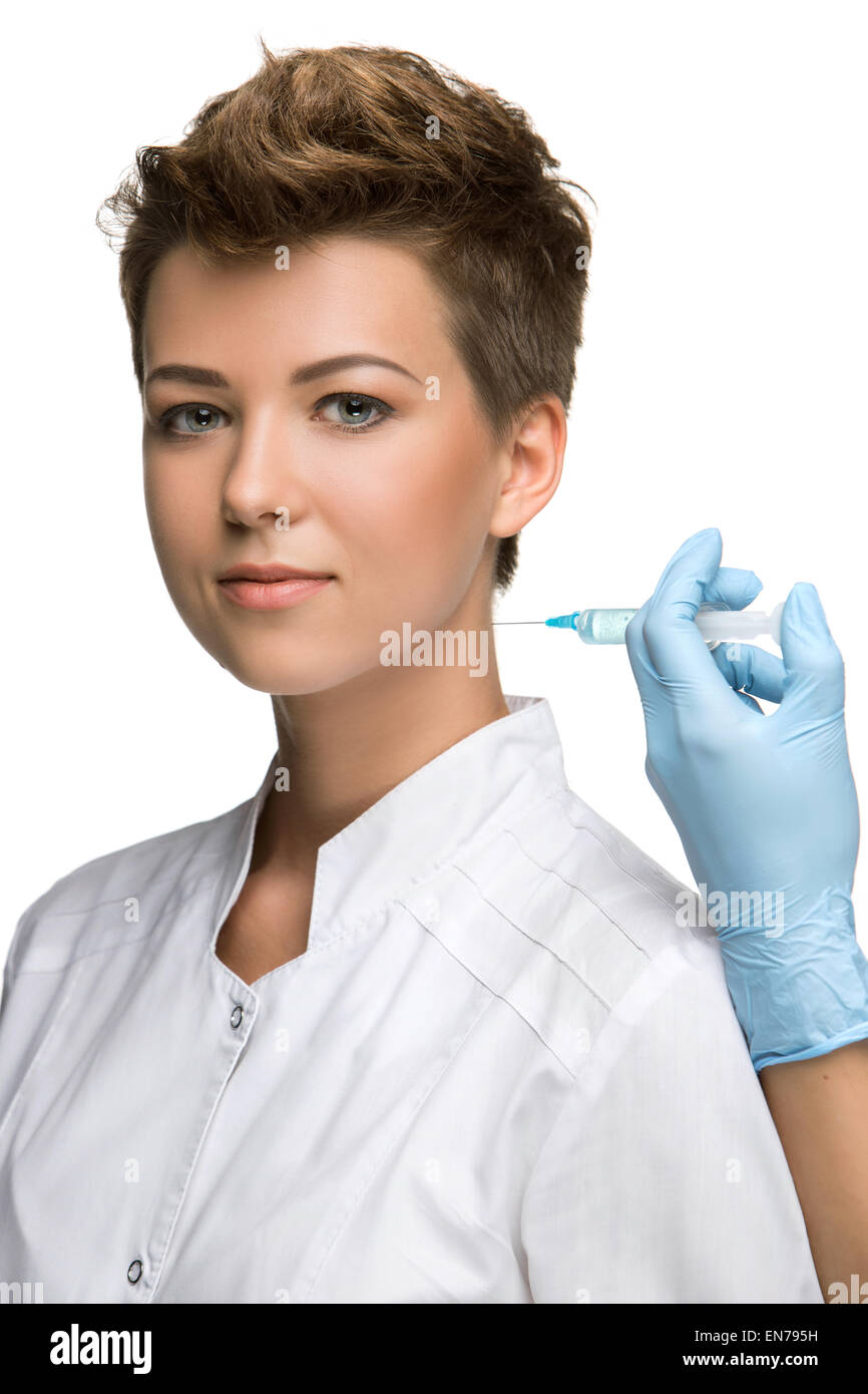 pretty young woman and vaccine syringe Stock Photo - Alamy