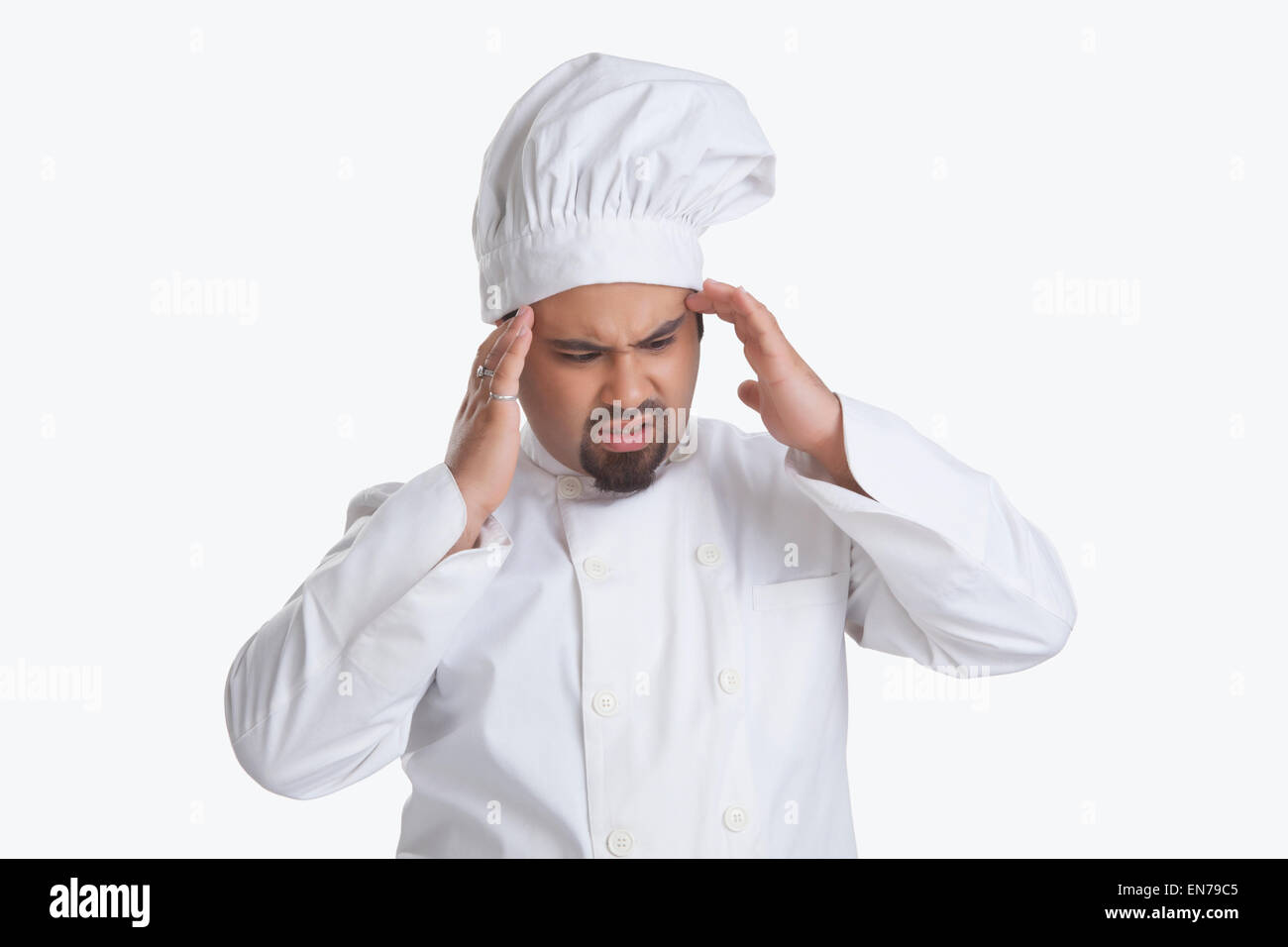 Chef with headache Stock Photo - Alamy