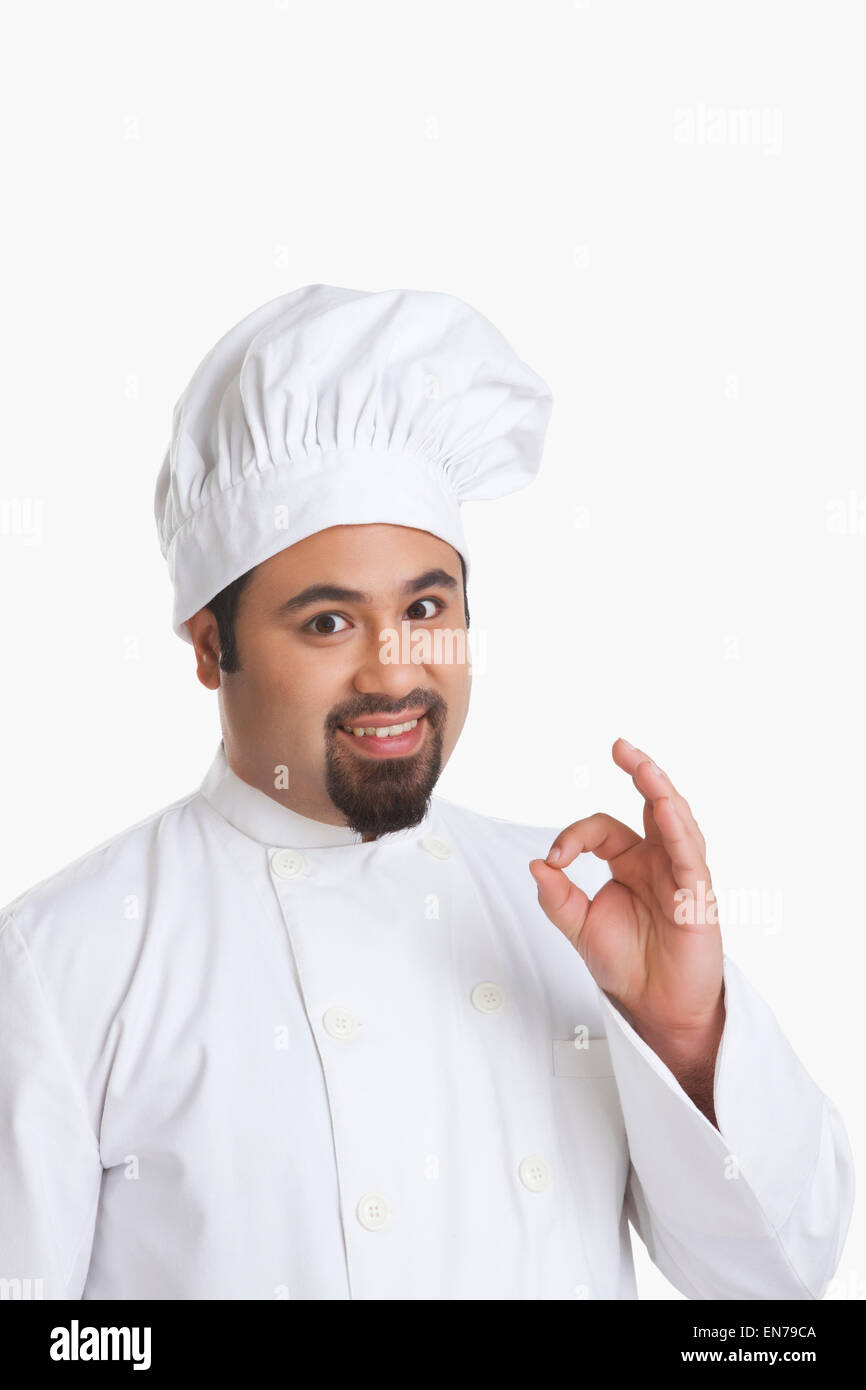 Portrait of chef giving ok hand gesture Stock Photo - Alamy