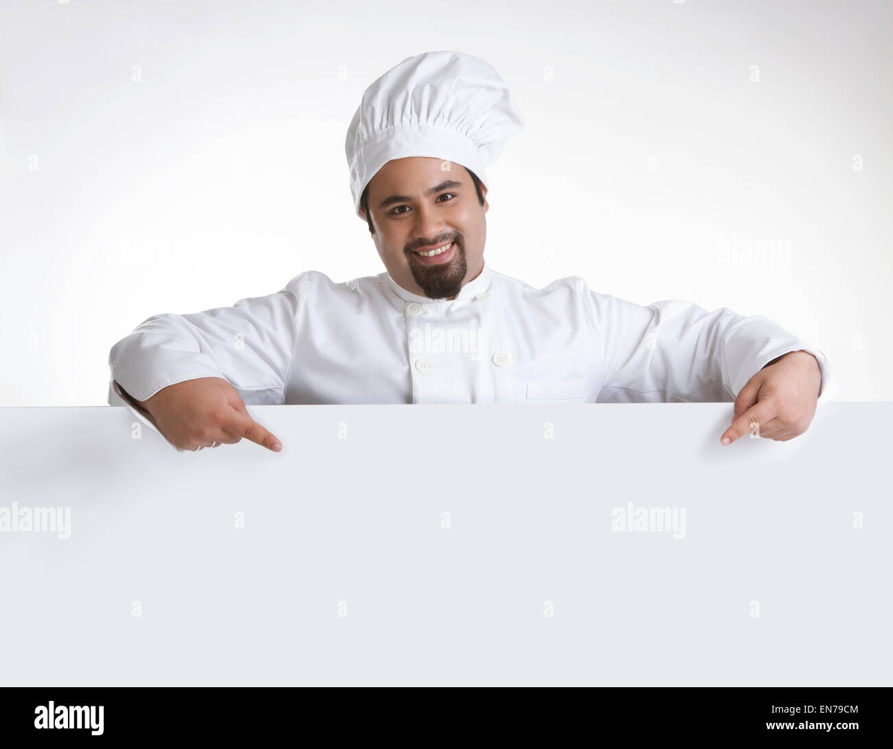 Portrait of chef pointing Stock Photo - Alamy