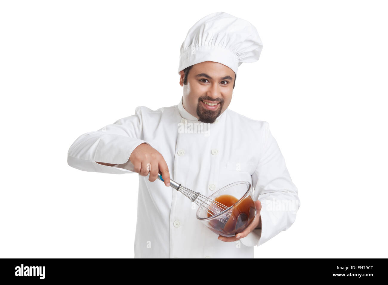 Portrait of chef mixing chocolate in a bowl Stock Photo - Alamy