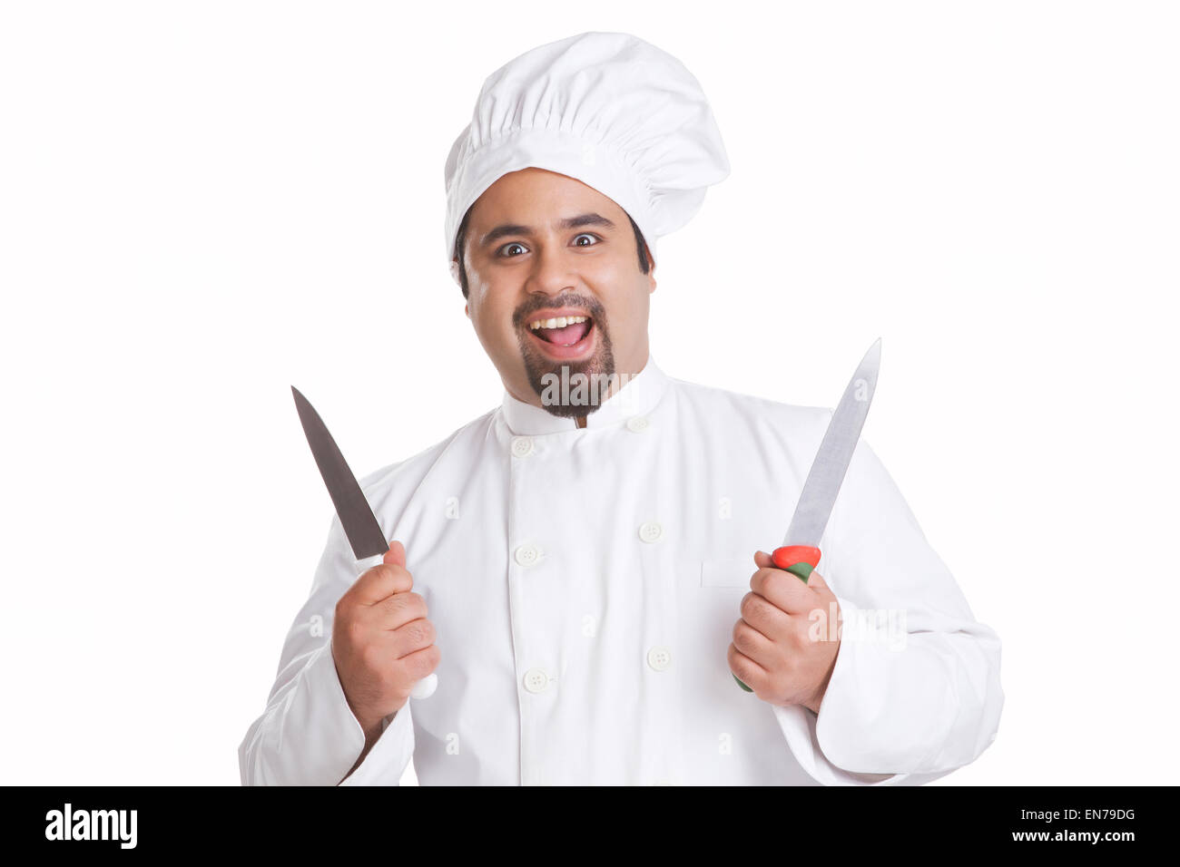 Portrait of chef holding knives Stock Photo - Alamy