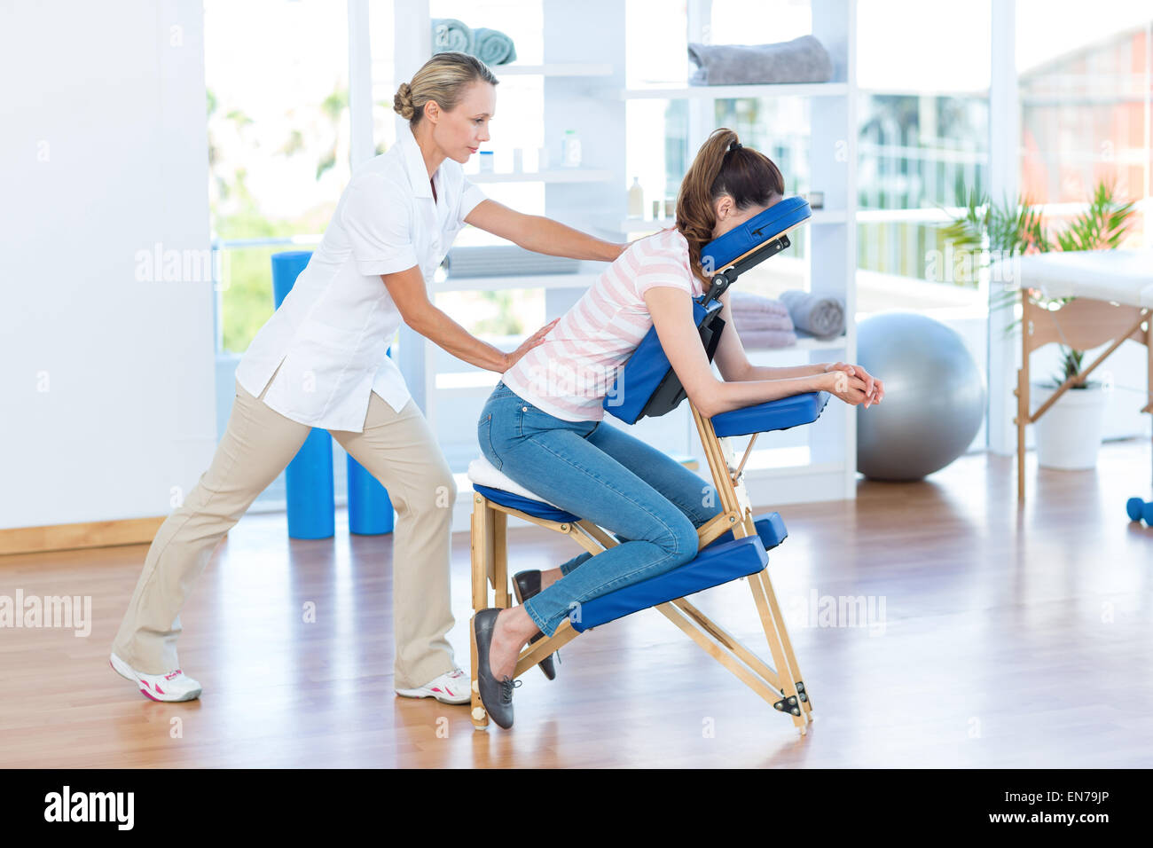 Woman having back massage Stock Photo - Alamy