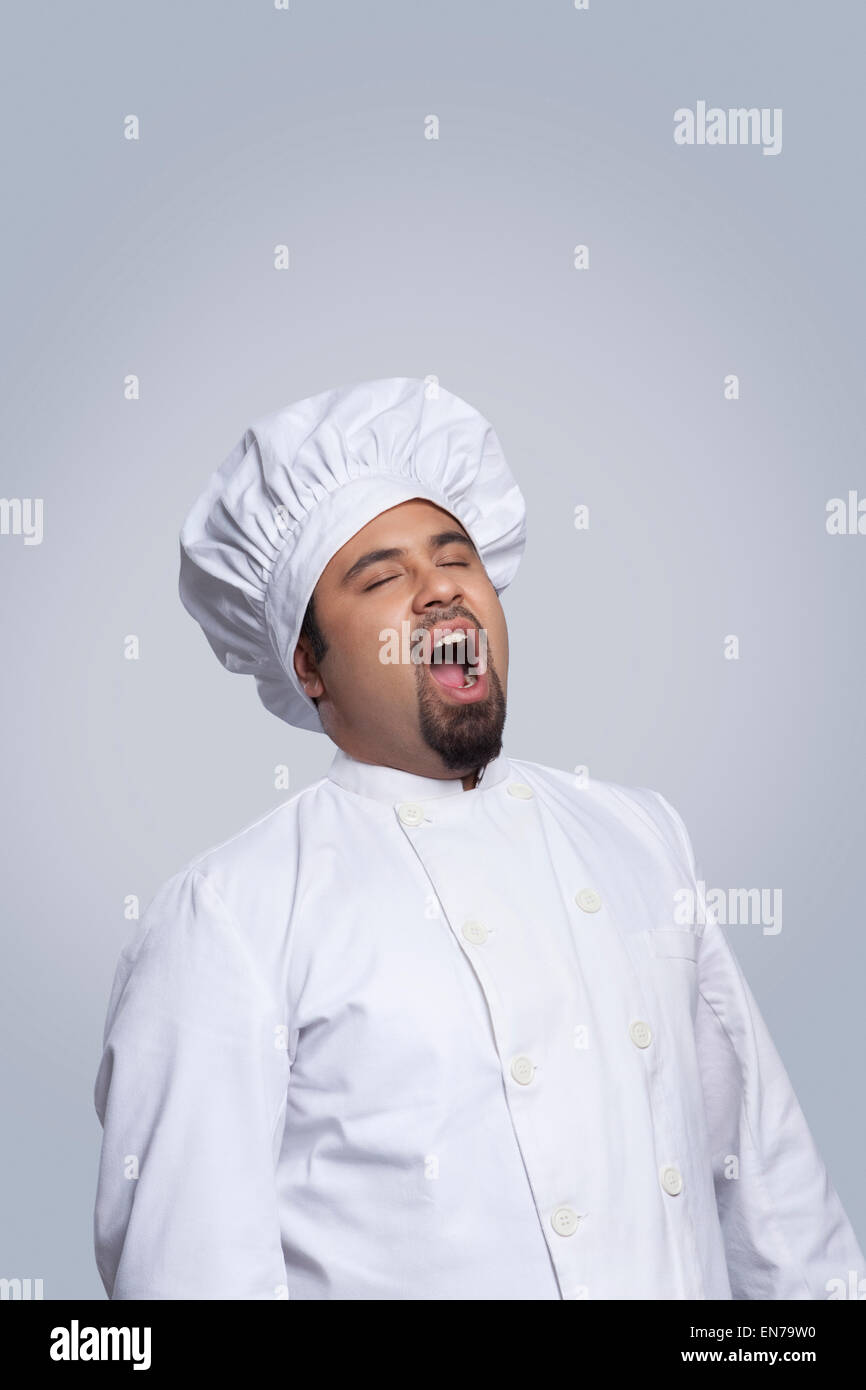 Chef yawning hi-res stock photography and images - Alamy