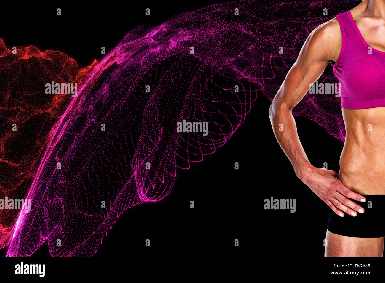 Composite image of female bodybuilder posing with hands on hips mid ...