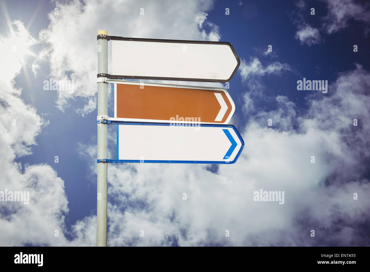 Signpost arrows with copy space Stock Photo - Alamy