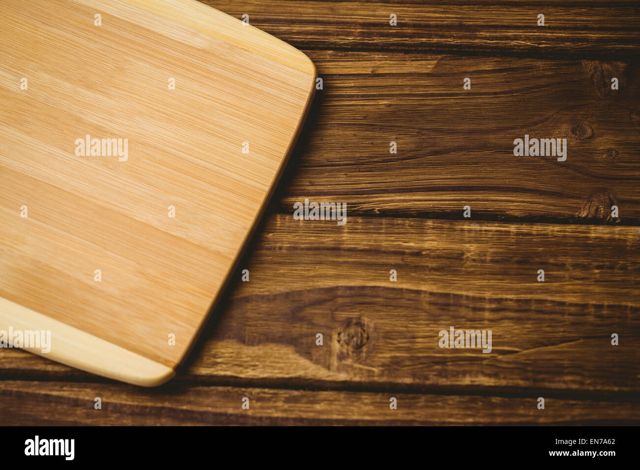 Wooden board on a table Stock Photo - Alamy