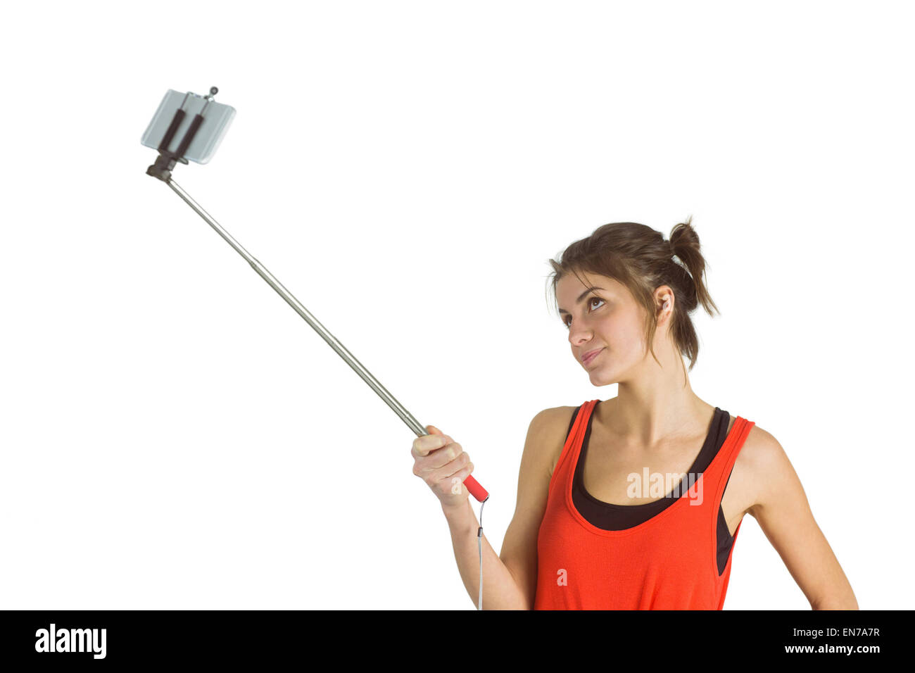 Attractive young brunette using Cut Out Stock Images & Pictures - Alamy