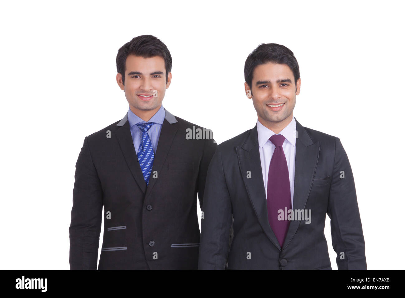 Portrait of two businessmen smiling Stock Photo - Alamy