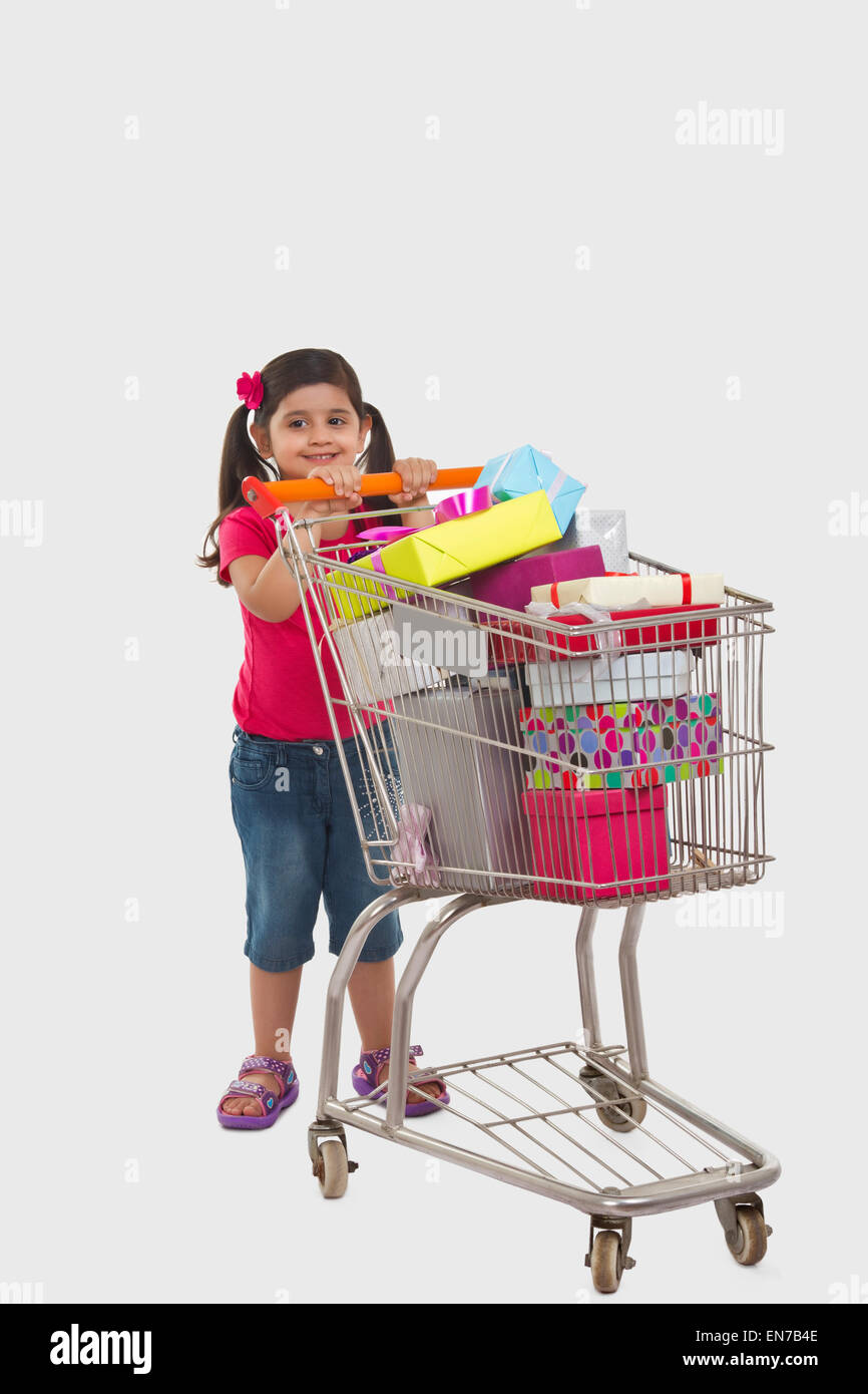 Girl with a shopping cart Stock Photo - Alamy