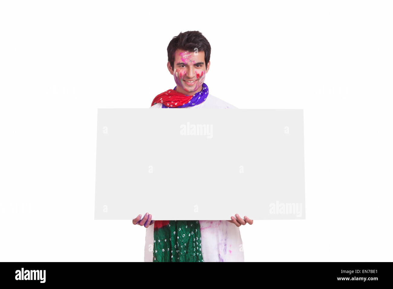Portrait of a young man holding a white board Stock Photo - Alamy
