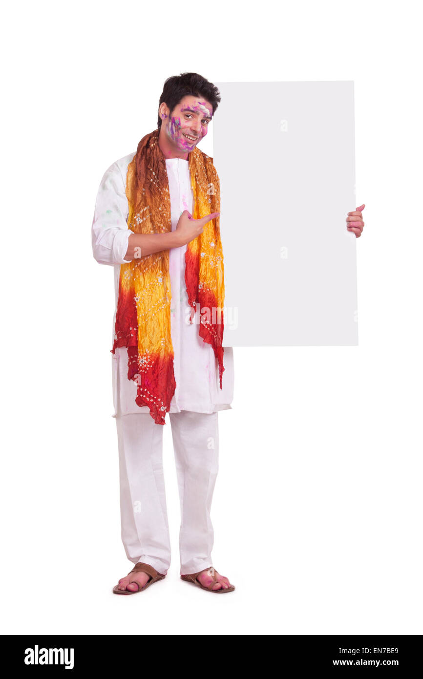 Portrait of a young man pointing to a white board Stock Photo - Alamy