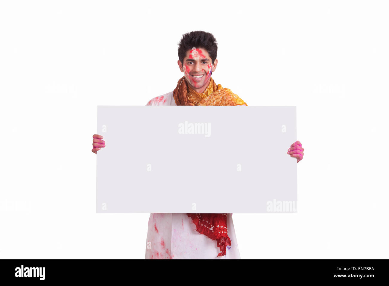 Portrait of a young man holding a white board Stock Photo - Alamy