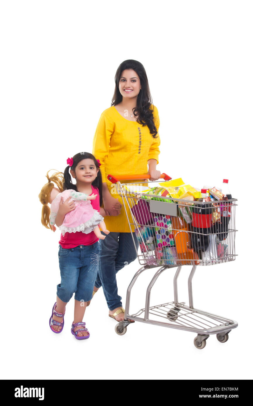 Portrait of mother and daughter with shopping cart Stock Photo - Alamy