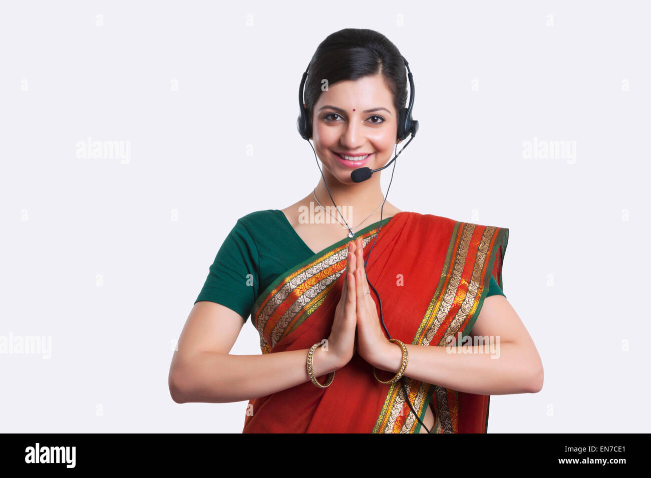 Portrait of call center operator greeting Stock Photo - Alamy