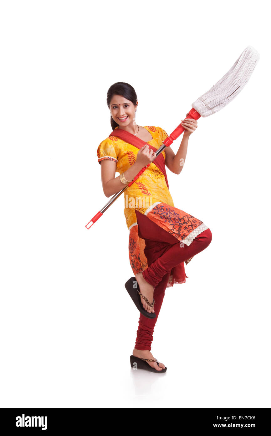 Portrait of a young WOMEN holding a mop Stock Photo - Alamy