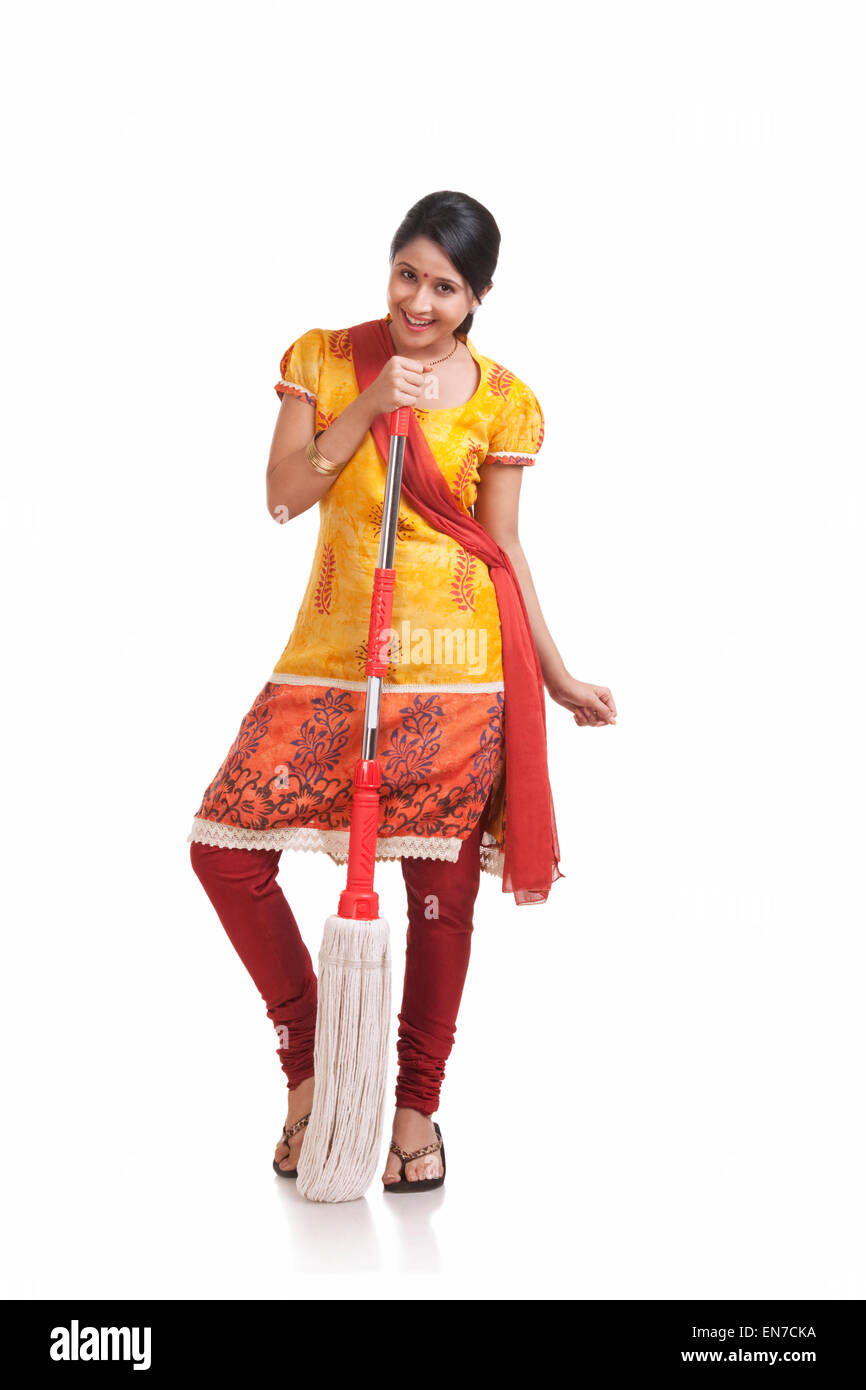 Portrait of a young WOMEN holding a mop Stock Photo - Alamy