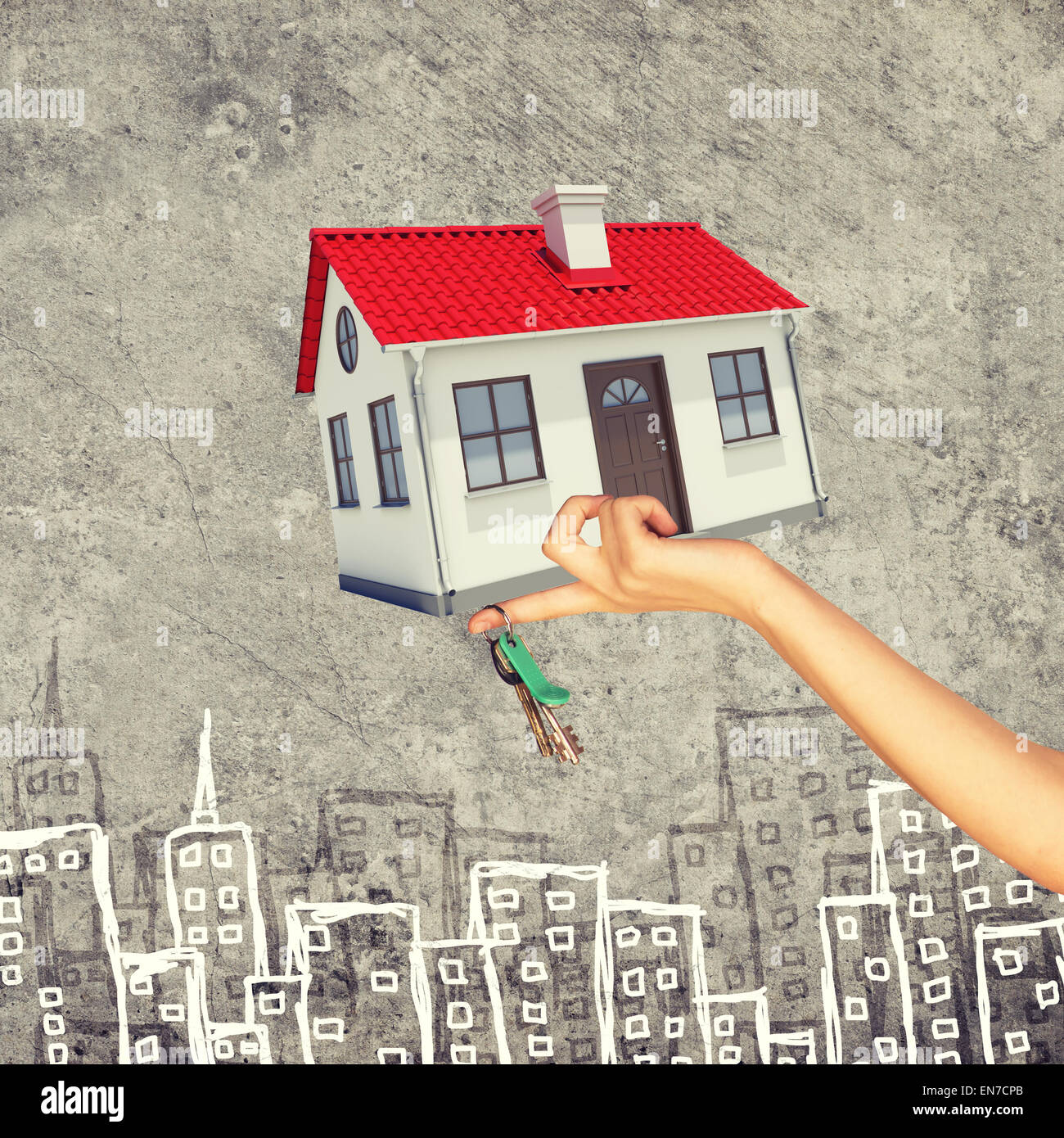 House and bunch of key on womans hand Stock Photo - Alamy