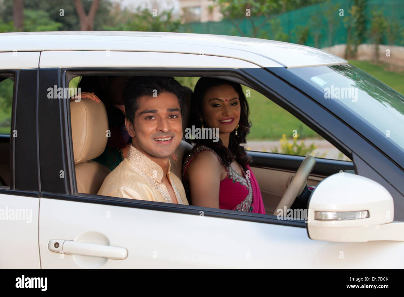 Portrait of couple in car Stock Photo - Alamy