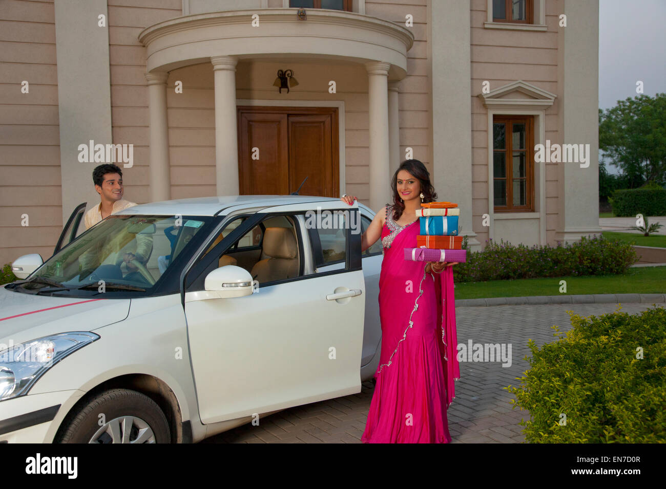 Man and woman getting out car hi-res stock photography and images - Alamy