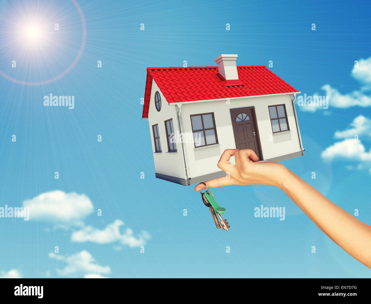 House and keys in womans left hand Stock Photo - Alamy