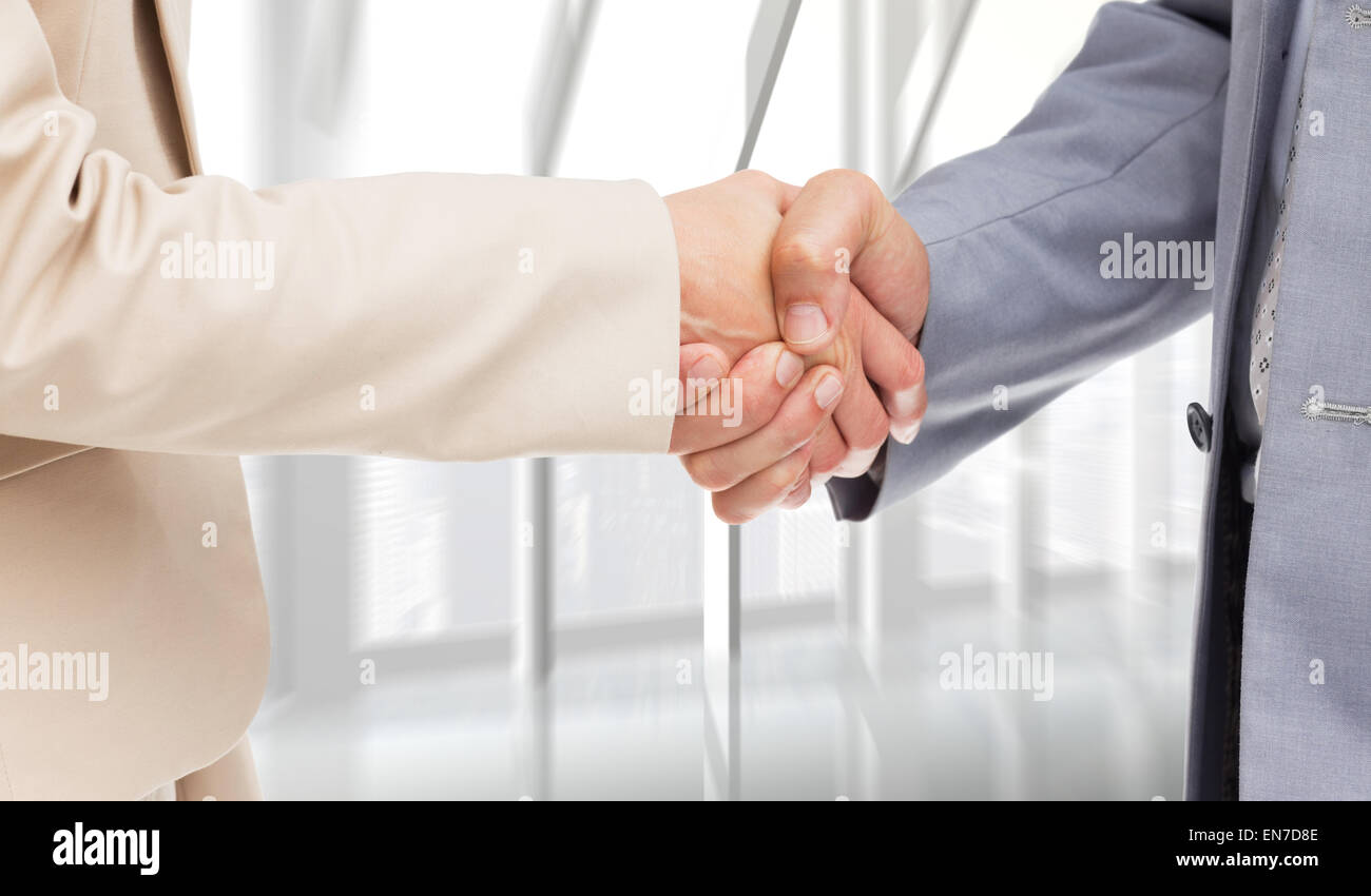 Composite image of close up of people shaking hands Stock Photo - Alamy