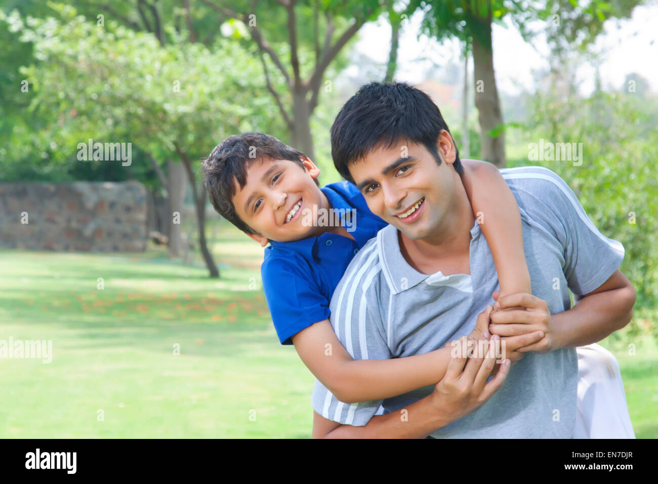 Portrait of father and son Stock Photo - Alamy